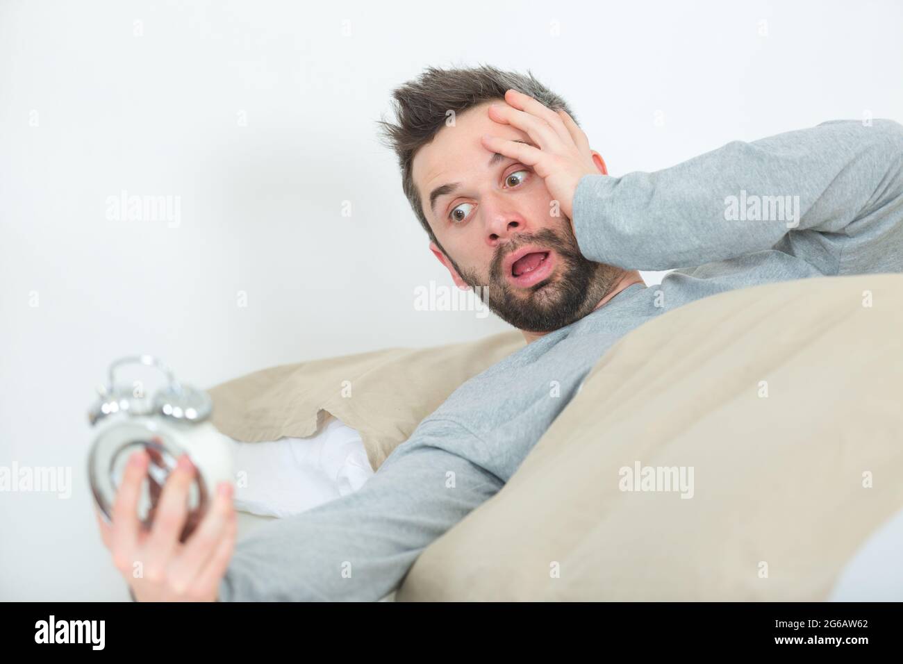 Waking up late hi-res stock photography and images - Alamy