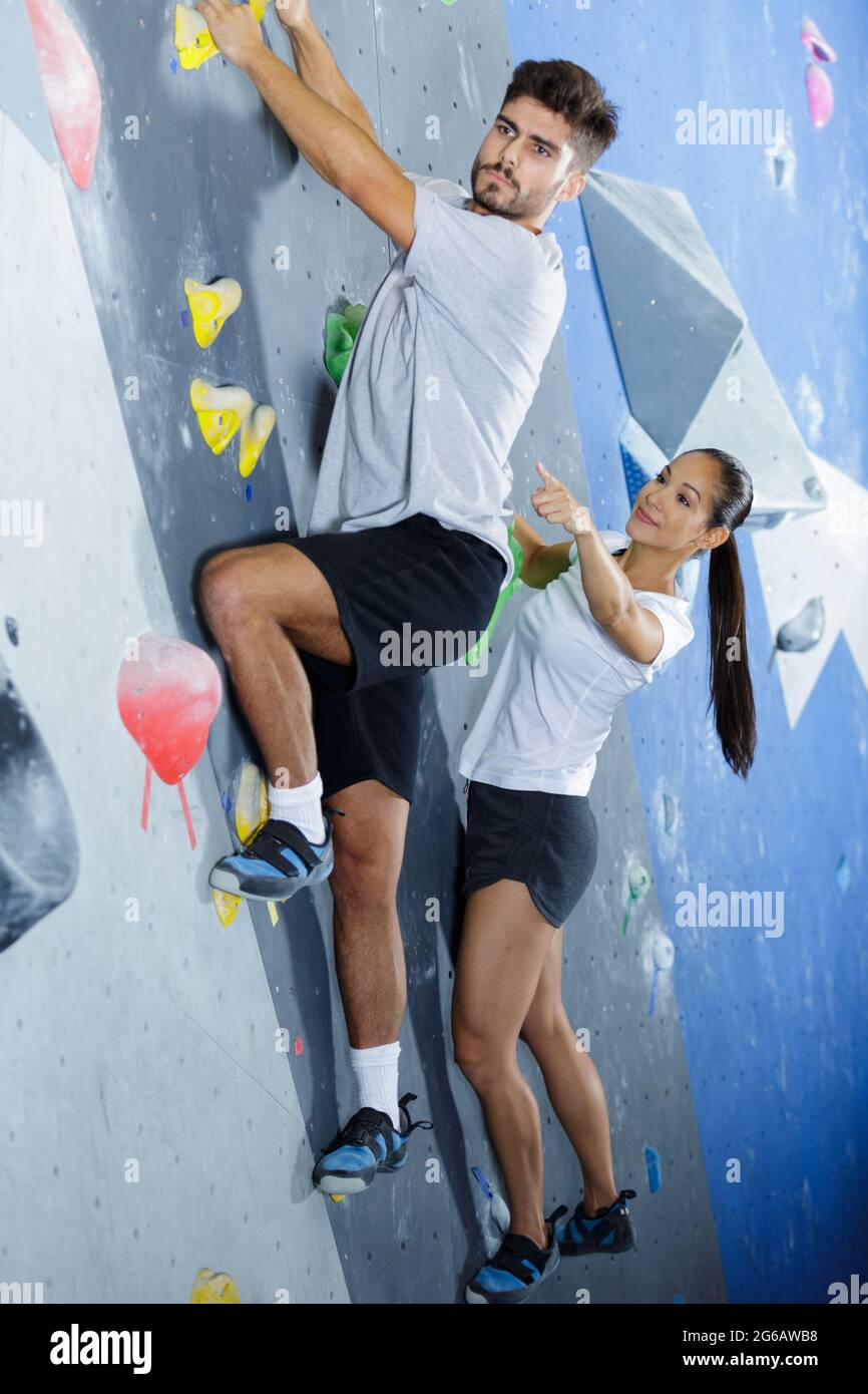 people going up a wall Stock Photo - Alamy