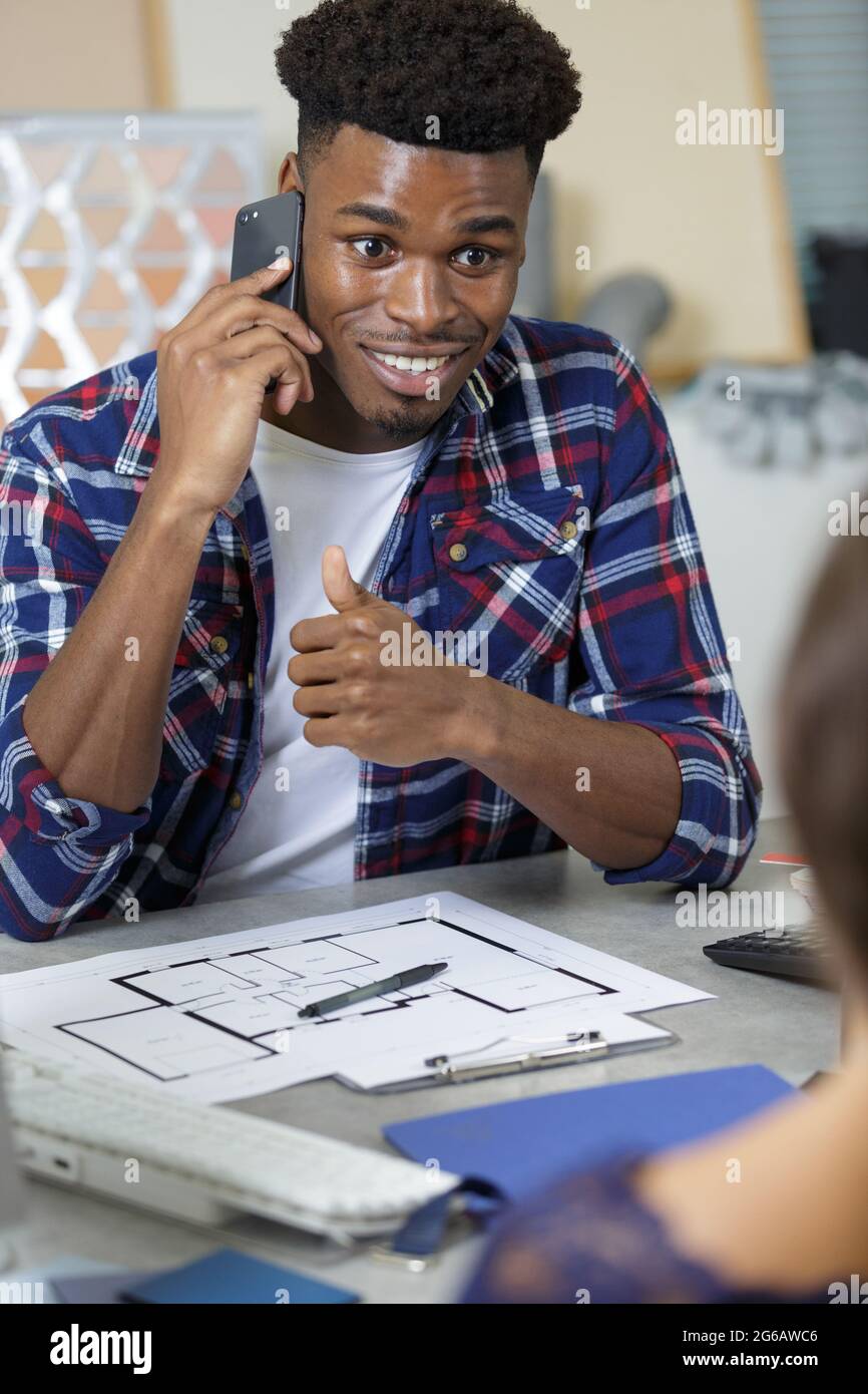 Interior designer talking client hi-res stock photography and images ...