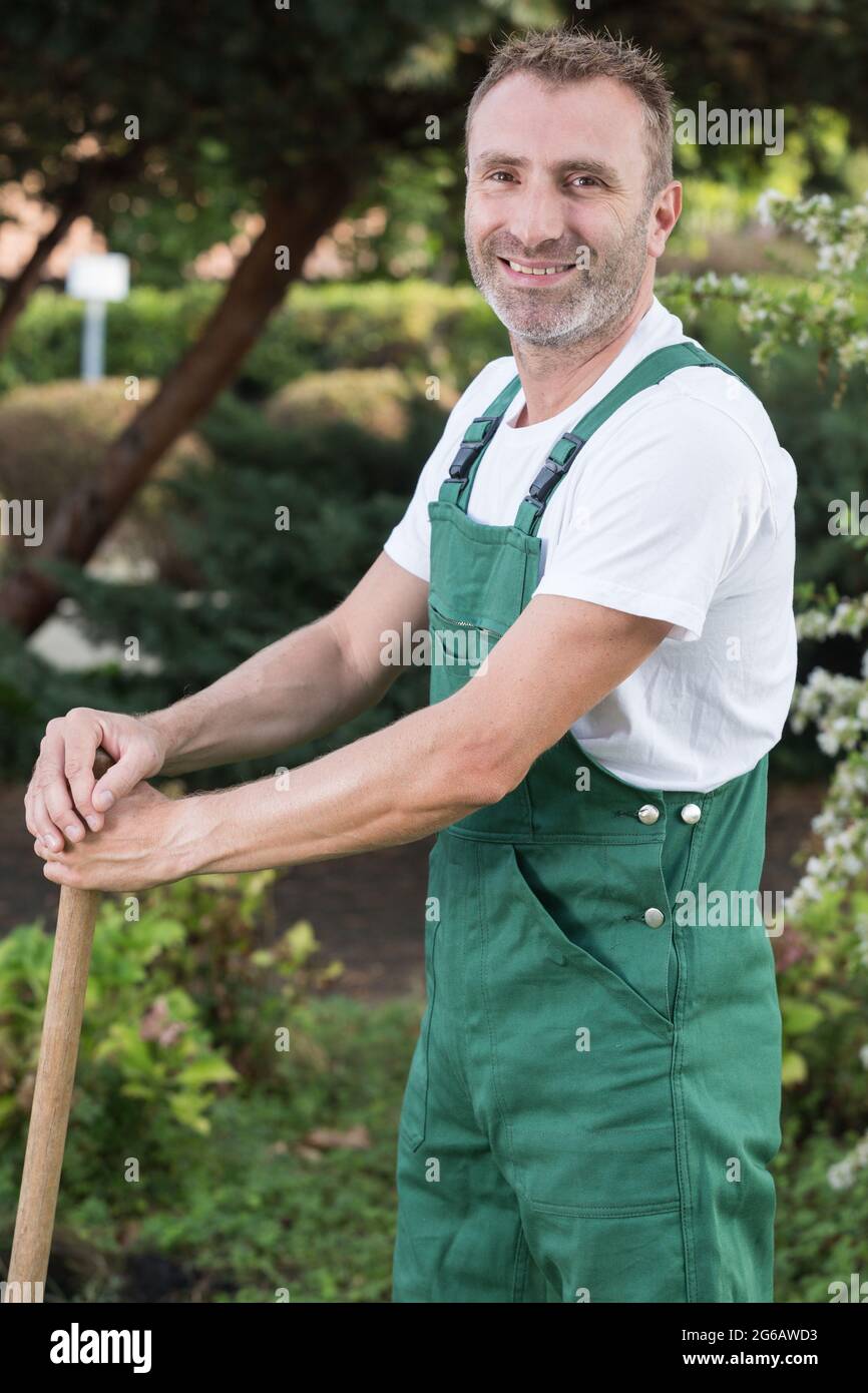 mature gardener with a spade Stock Photo - Alamy