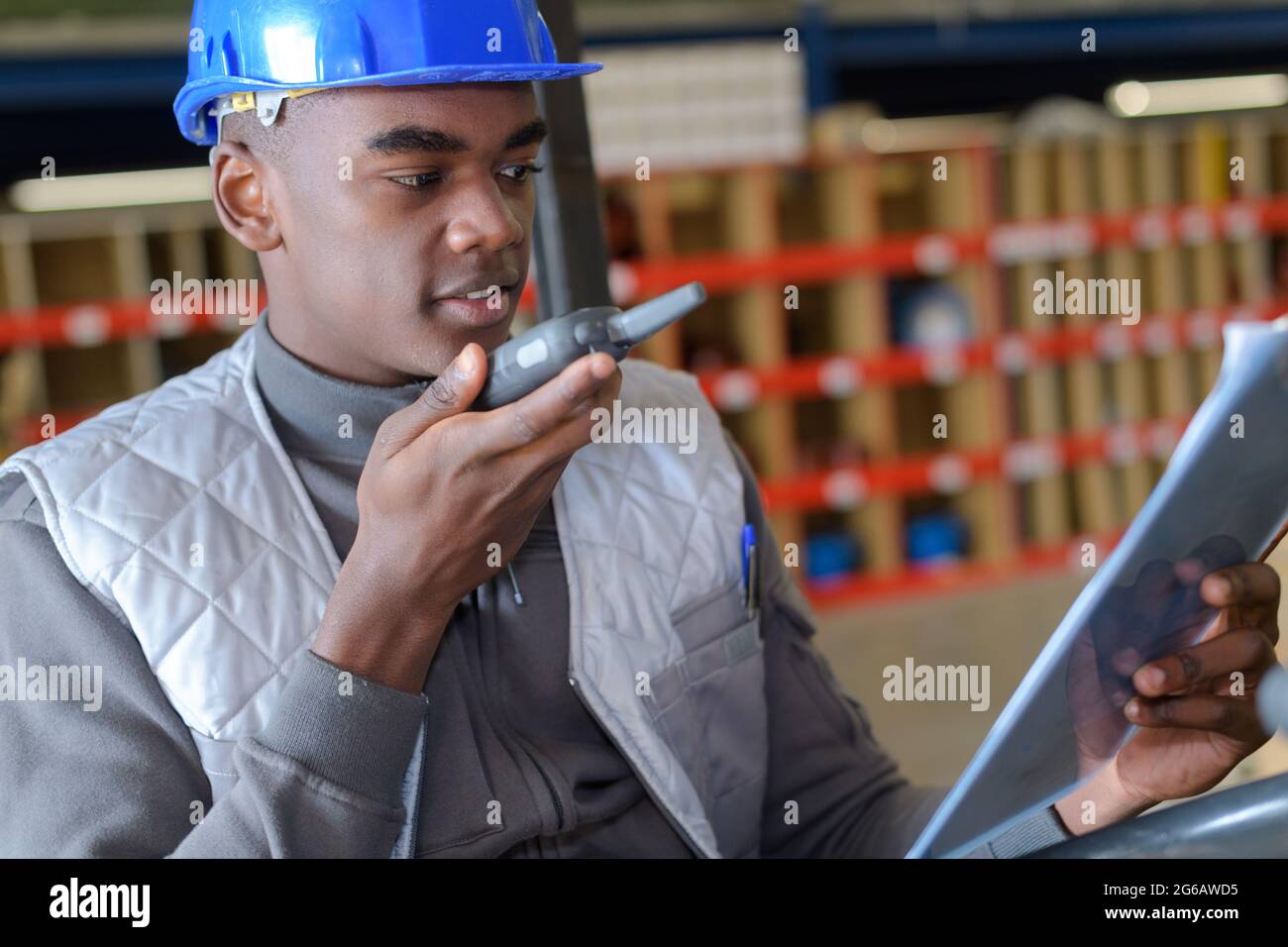 hardware store worker checking supplies in the warehouse Stock Photo ...