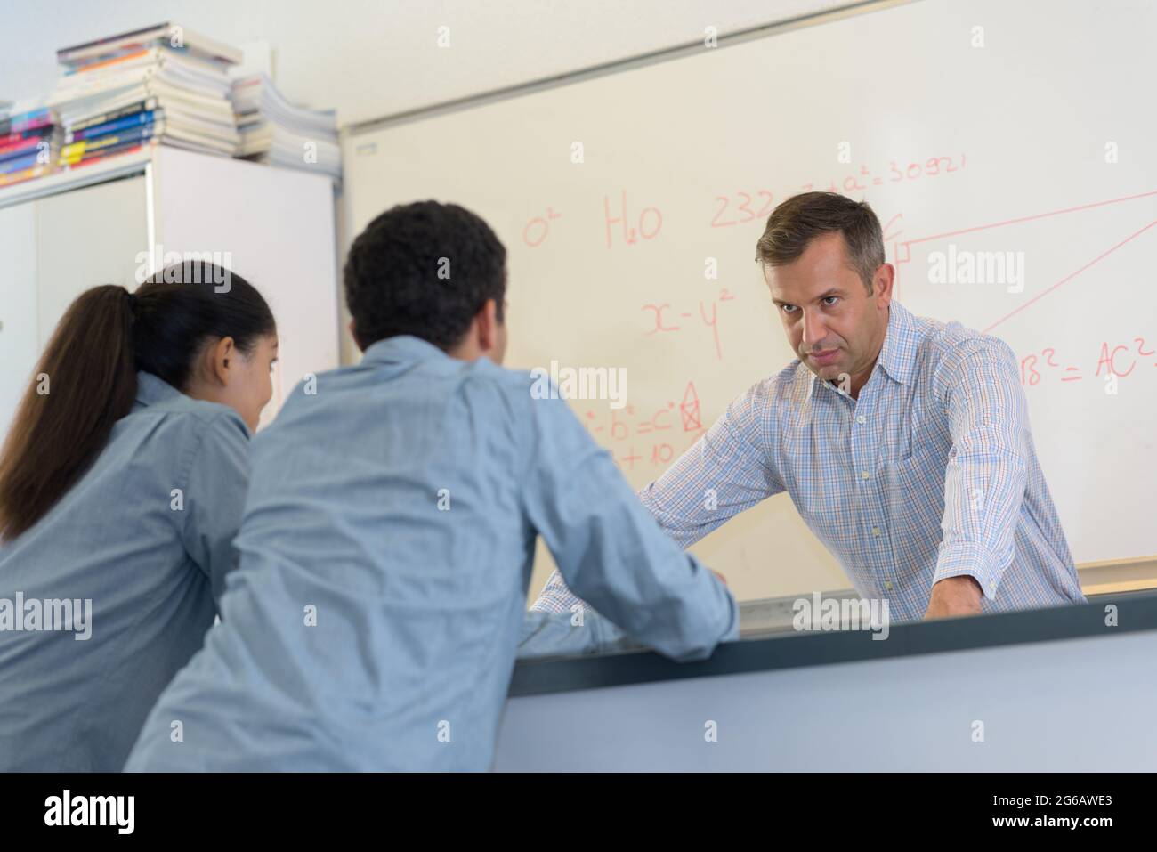 professor debating with his students Stock Photo - Alamy