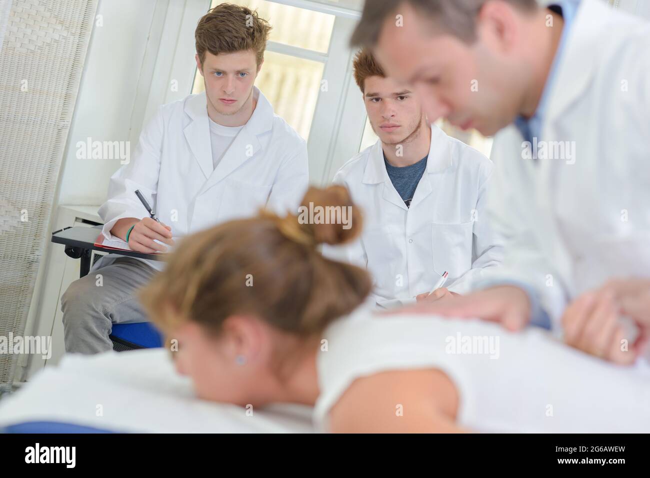 Students learning from a doctor Stock Photo - Alamy