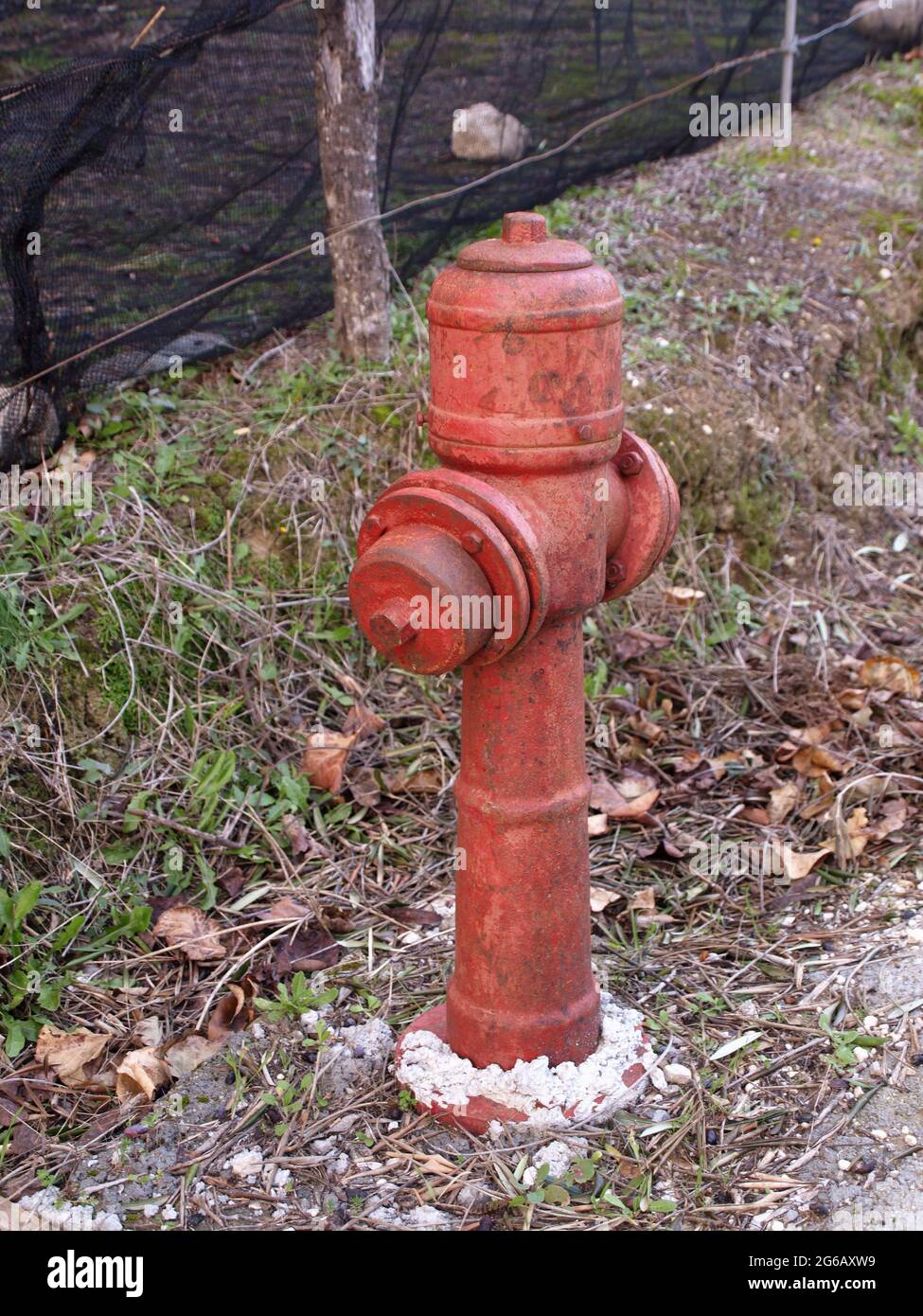 Red fire hydrant on roadside in Corfu, Greece Stock Photo - Alamy
