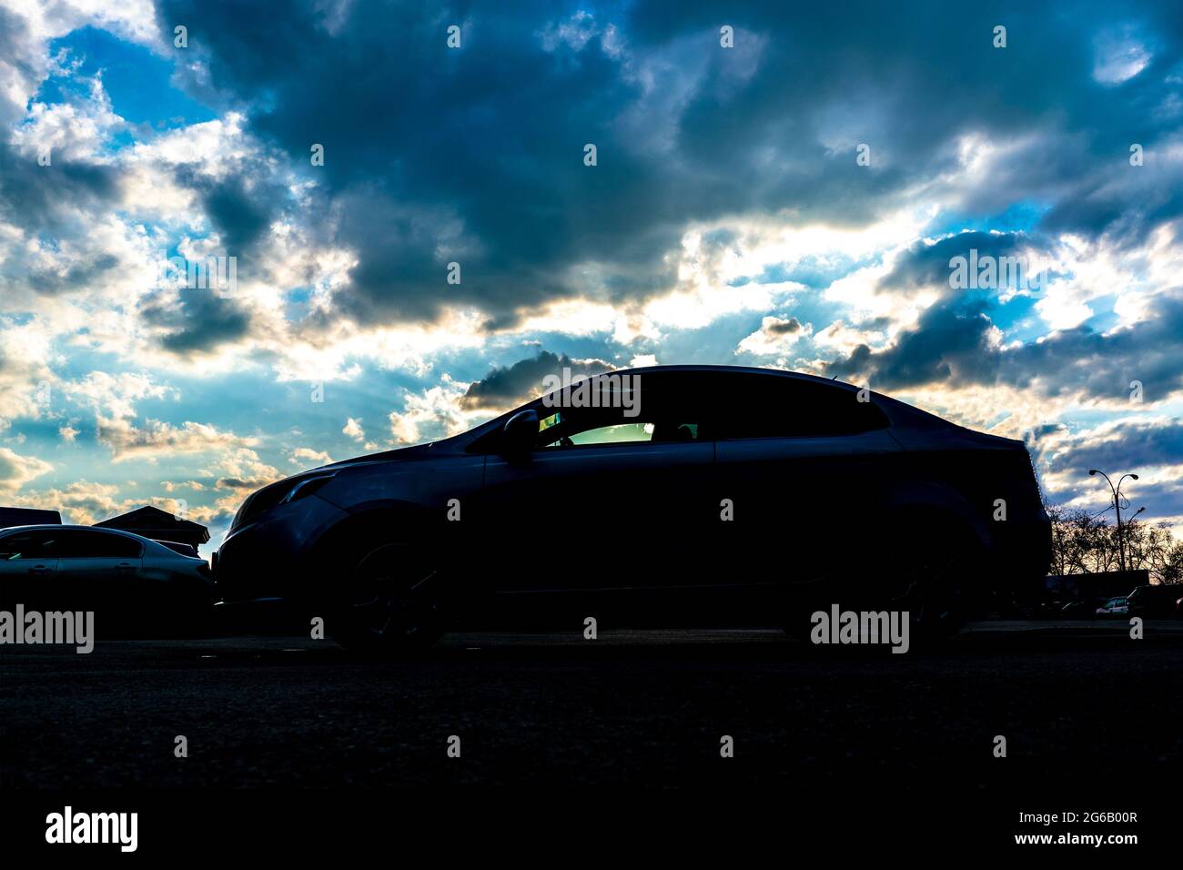 car silhouette on evening sky during the sunset Stock Photo - Alamy
