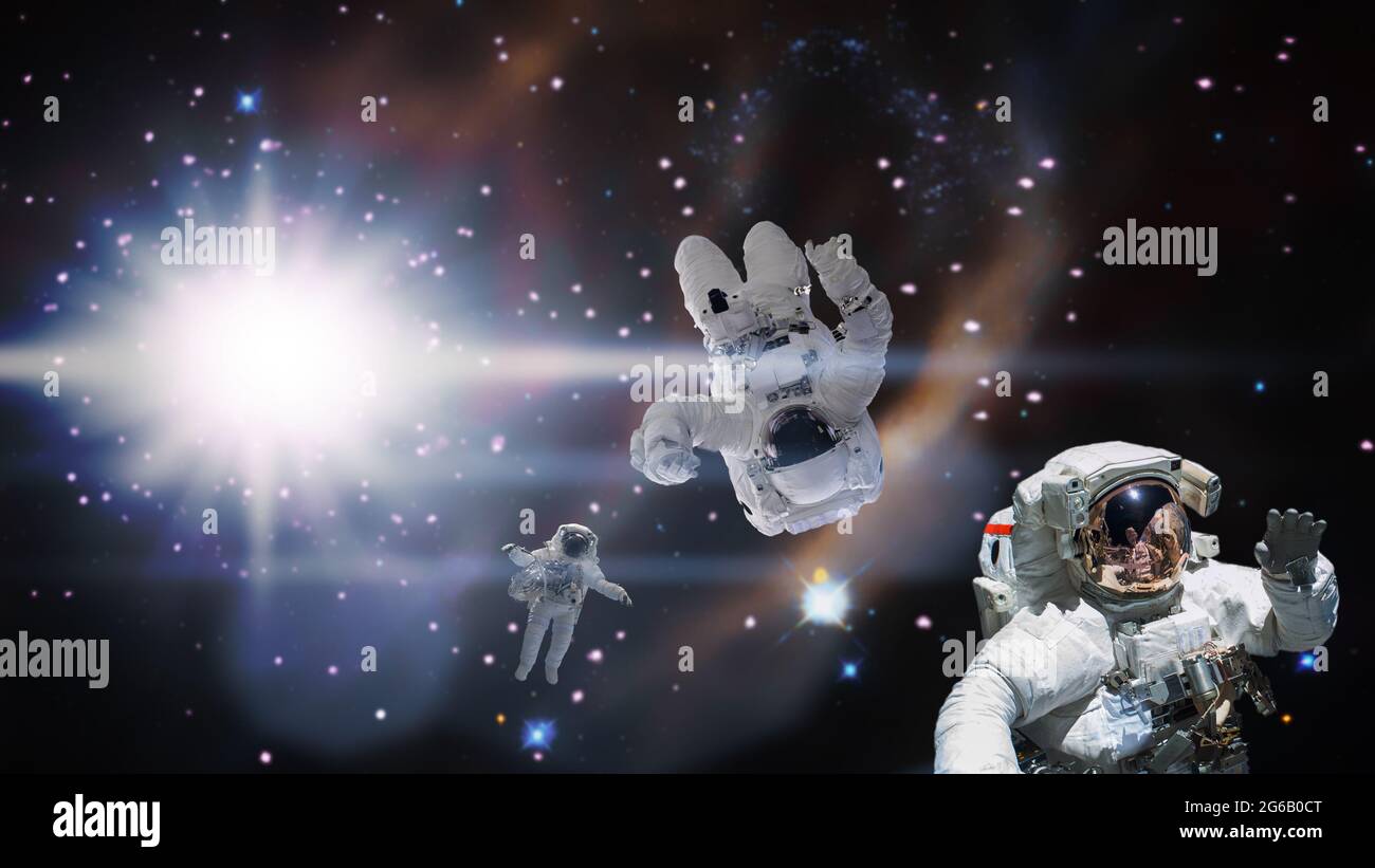 group of astronauts walking in space and completing space mission ...