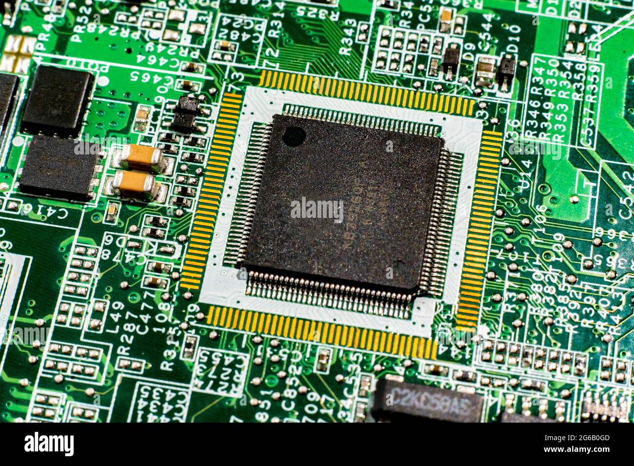 electric chip on a green circuit board close up, pcb Stock Photo - Alamy