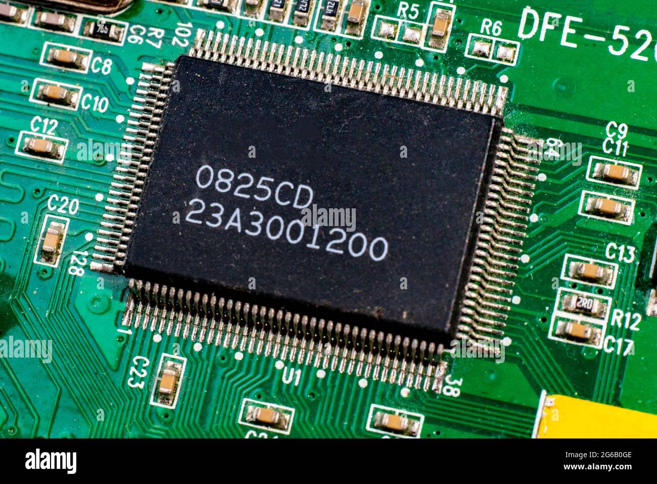 electric chip on a green circuit board close up, pcb Stock Photo - Alamy