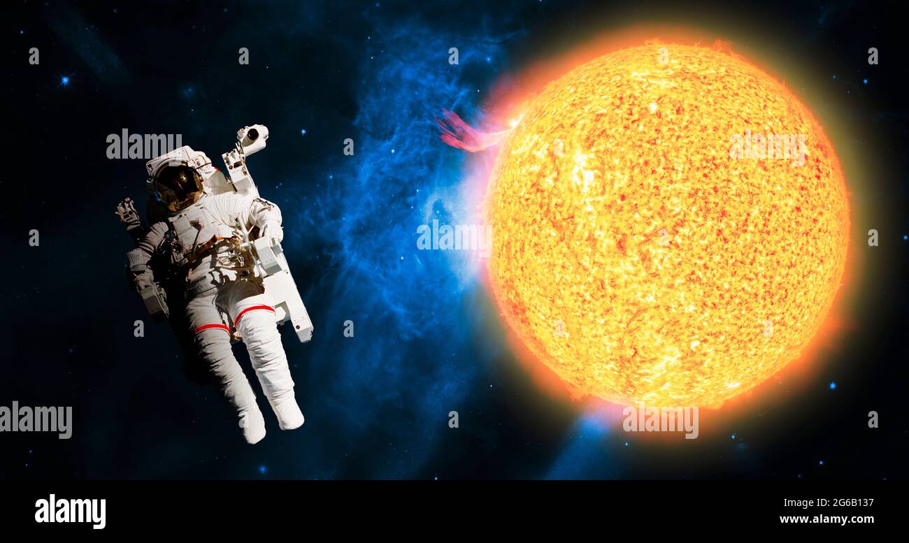 astronaut perform space mission in front of the sun, elements of this ...