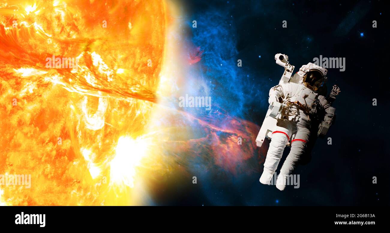 astronaut perform space mission in front of the sun, elements of this ...
