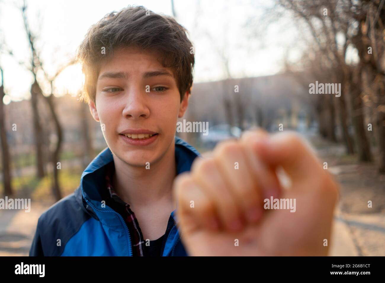 first person view of person bullying and threating to the boy Stock ...