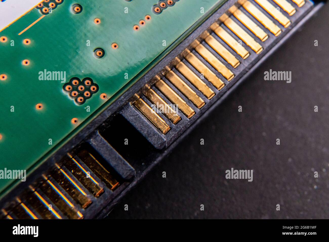 golden electric contacts of circuit board or battery Stock Photo - Alamy