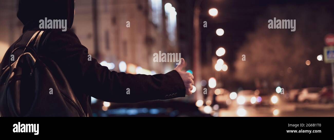 Man hitchhiker night hi-res stock photography and images - Alamy