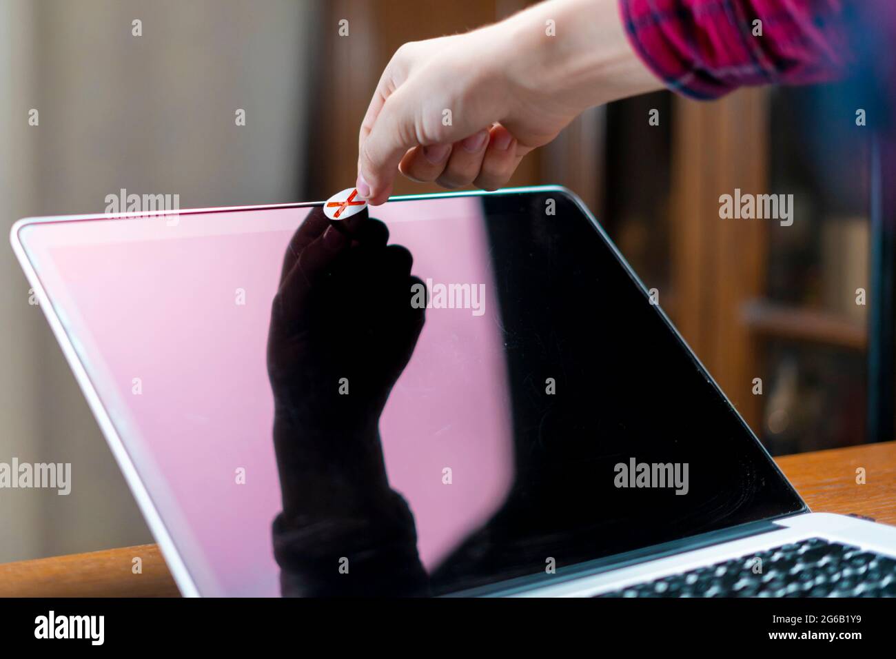 persons hand tape front gadget camera, conspiracy theory Stock Photo ...