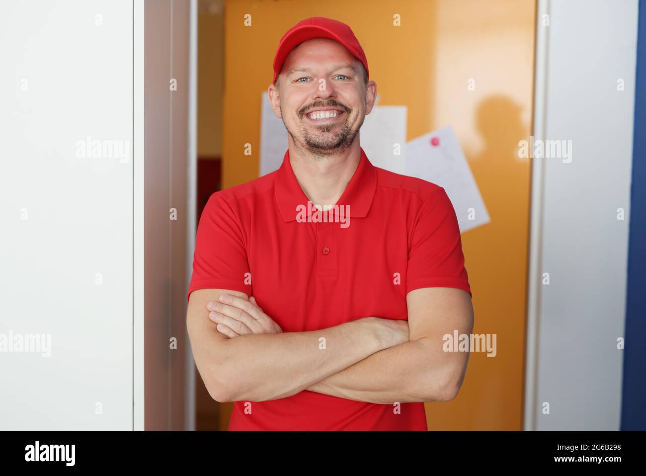 Courier in cap uniform hi-res stock photography and images - Alamy
