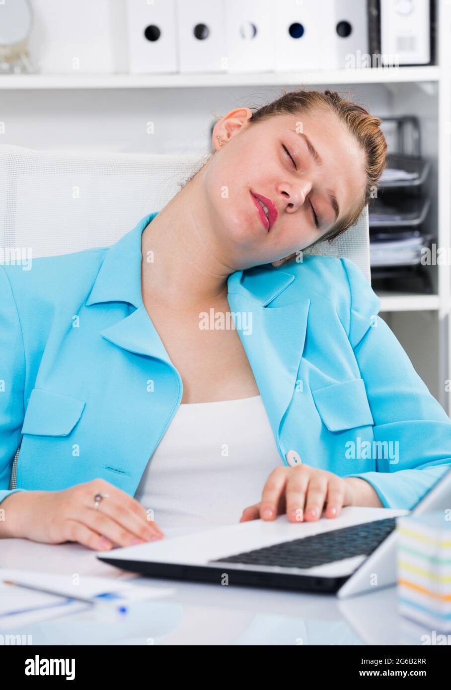 Female employee is sleeping after productive day at work Stock Photo ...
