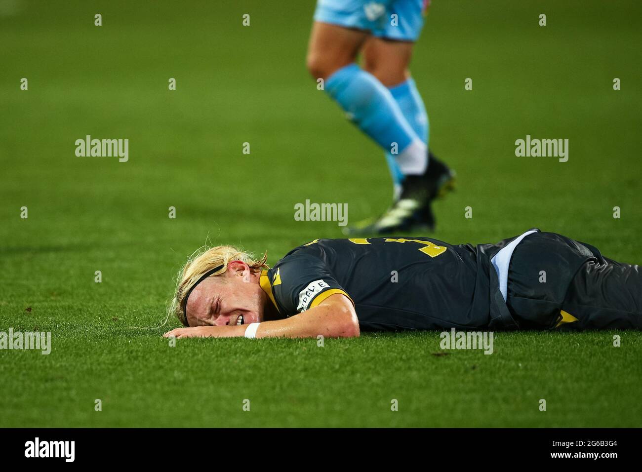 MELBOURNE, AUSTRALIA - MARCH 12: Lachlan Rose of Macarthur FC gets a ...