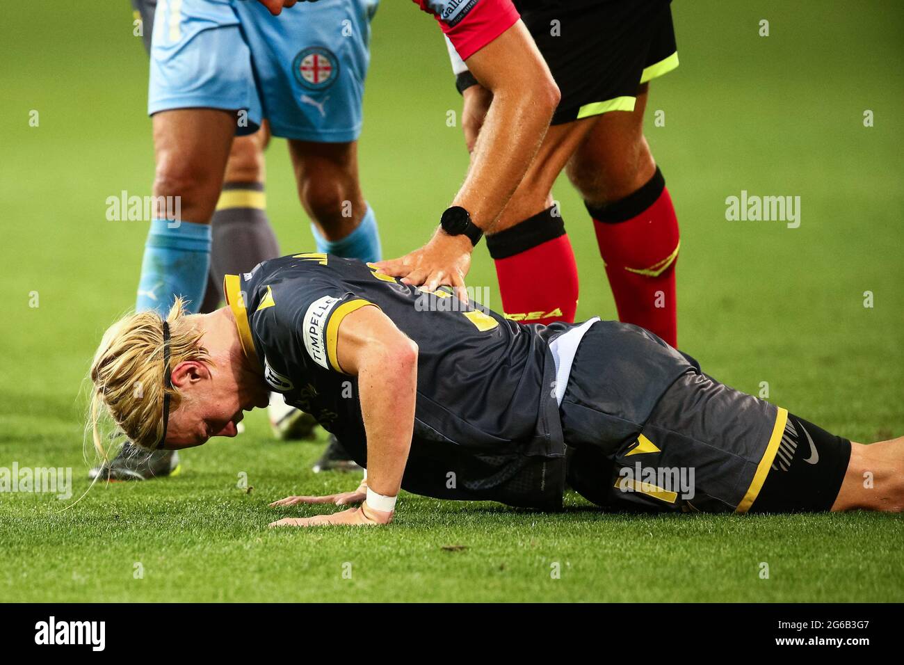 MELBOURNE, AUSTRALIA - MARCH 12: Lachlan Rose of Macarthur FC gets a ...