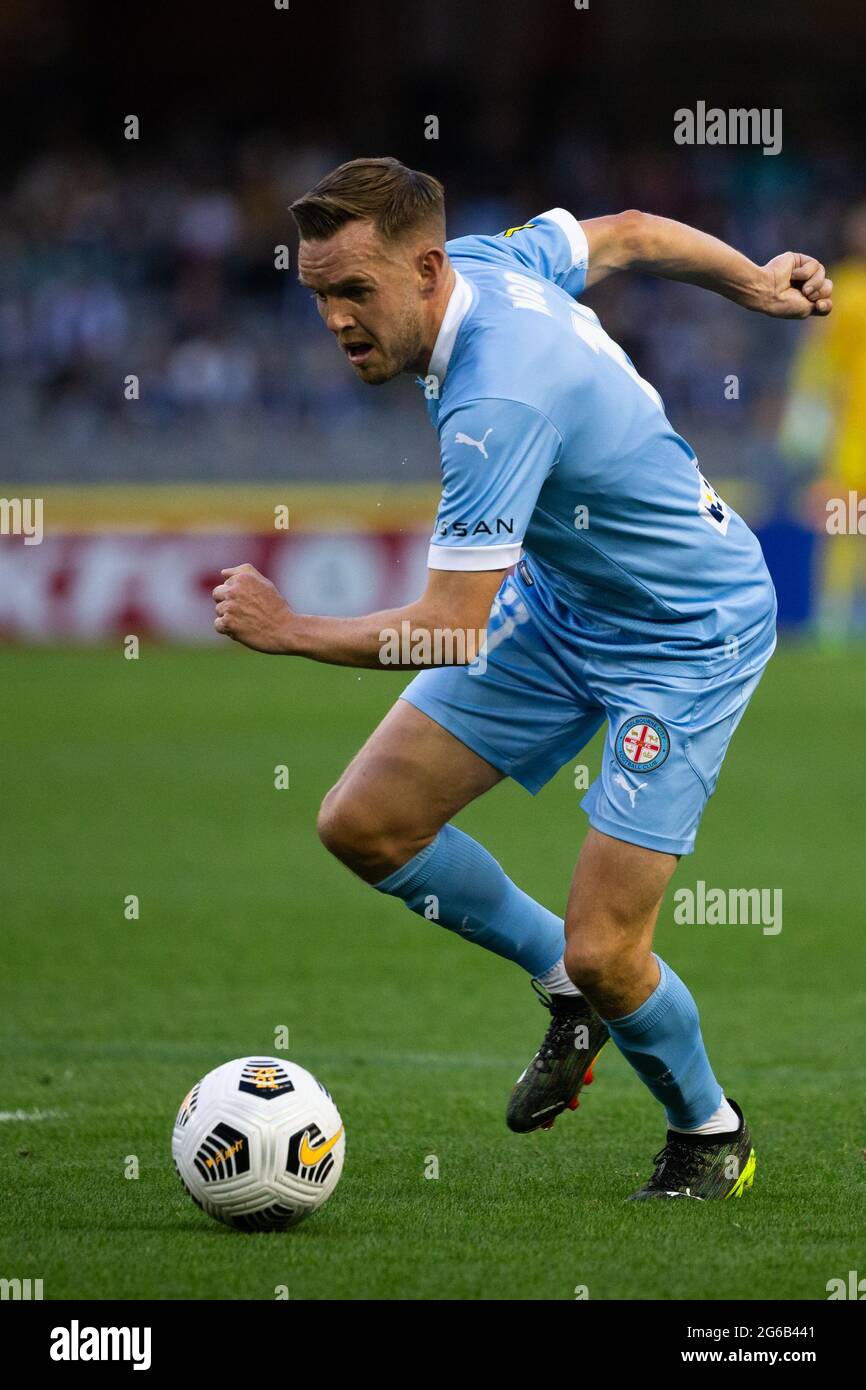 MELBOURNE, AUSTRALIA - MARCH 6: Craig Noone of Melbourne City controls ...
