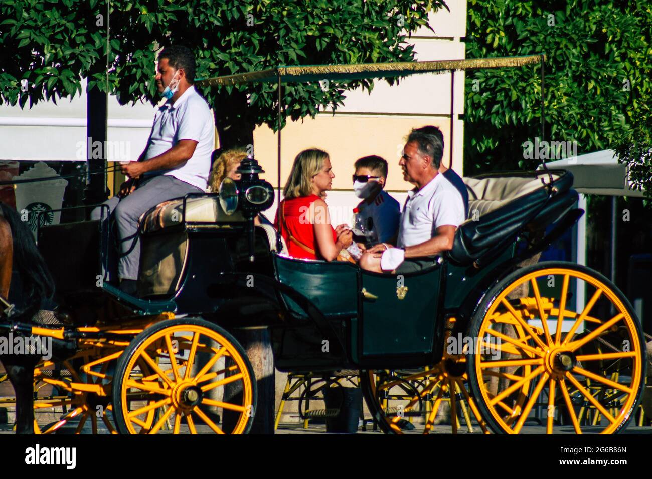 Seville Spain July 04, 2021 Horse drawn carriage ride through Seville ...