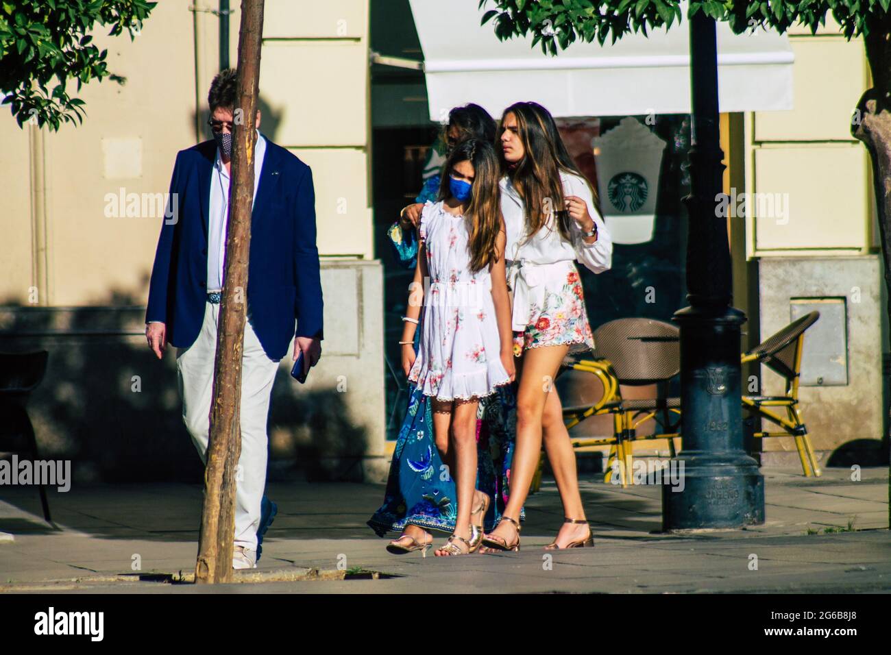 Seville Spain July 04, 2021 Pedestrians walking in the streets of ...