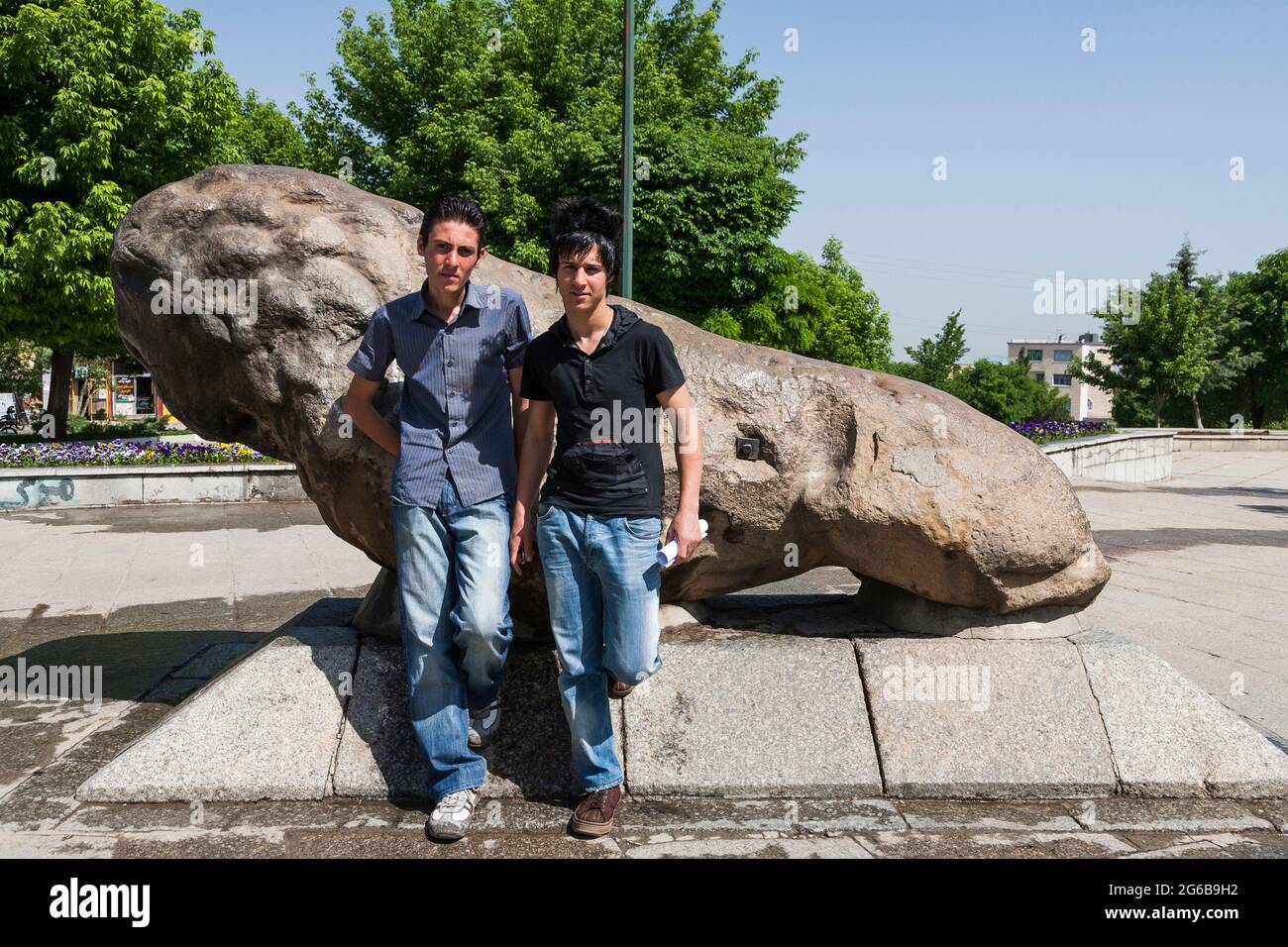 Young boys at Sang-e Shir, the stone Lion, ancient Ecbatana, Hamedan ...