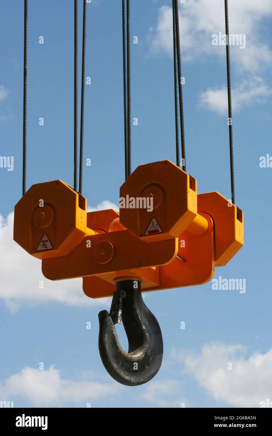 Powerful crane hook. Industrial background Stock Photo - Alamy