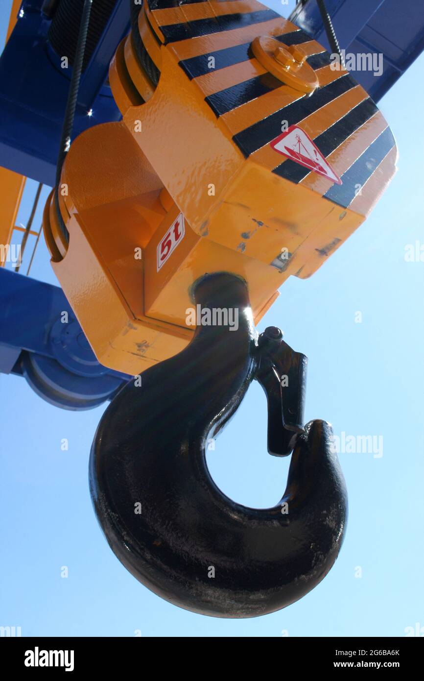 Powerful crane hook. Industrial background Stock Photo - Alamy