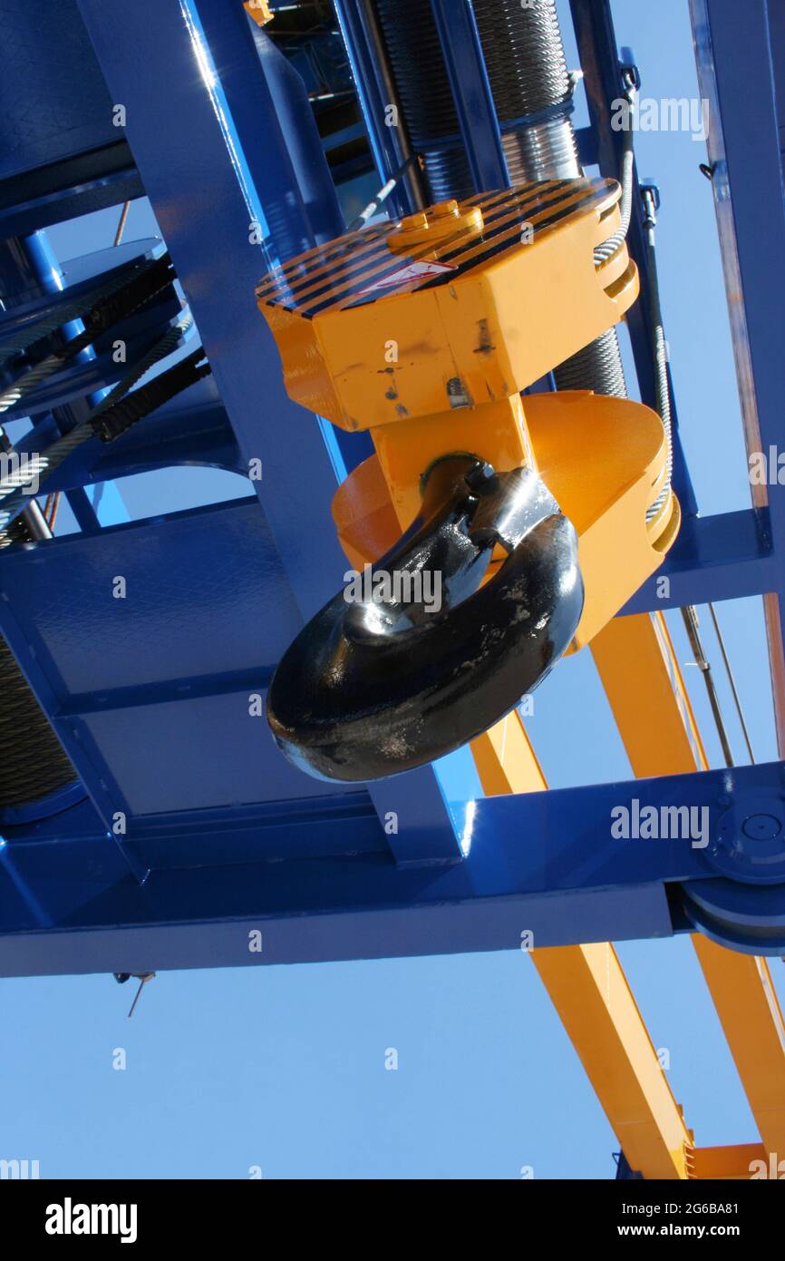 Powerful crane hook. Industrial background Stock Photo - Alamy