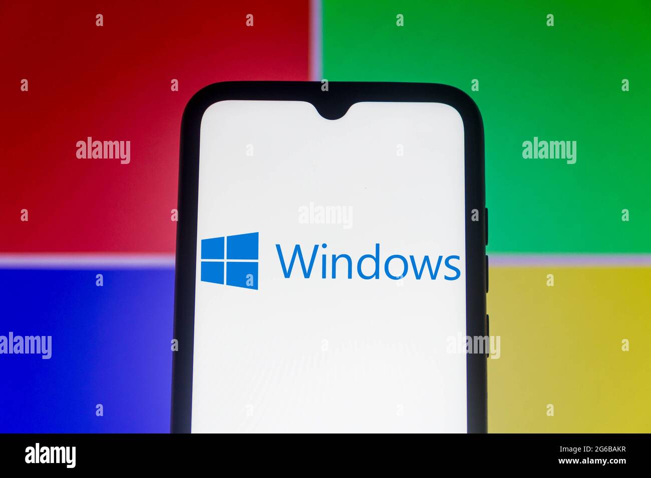 In this photo illustration the Windows 11 logo seen displayed on a ...