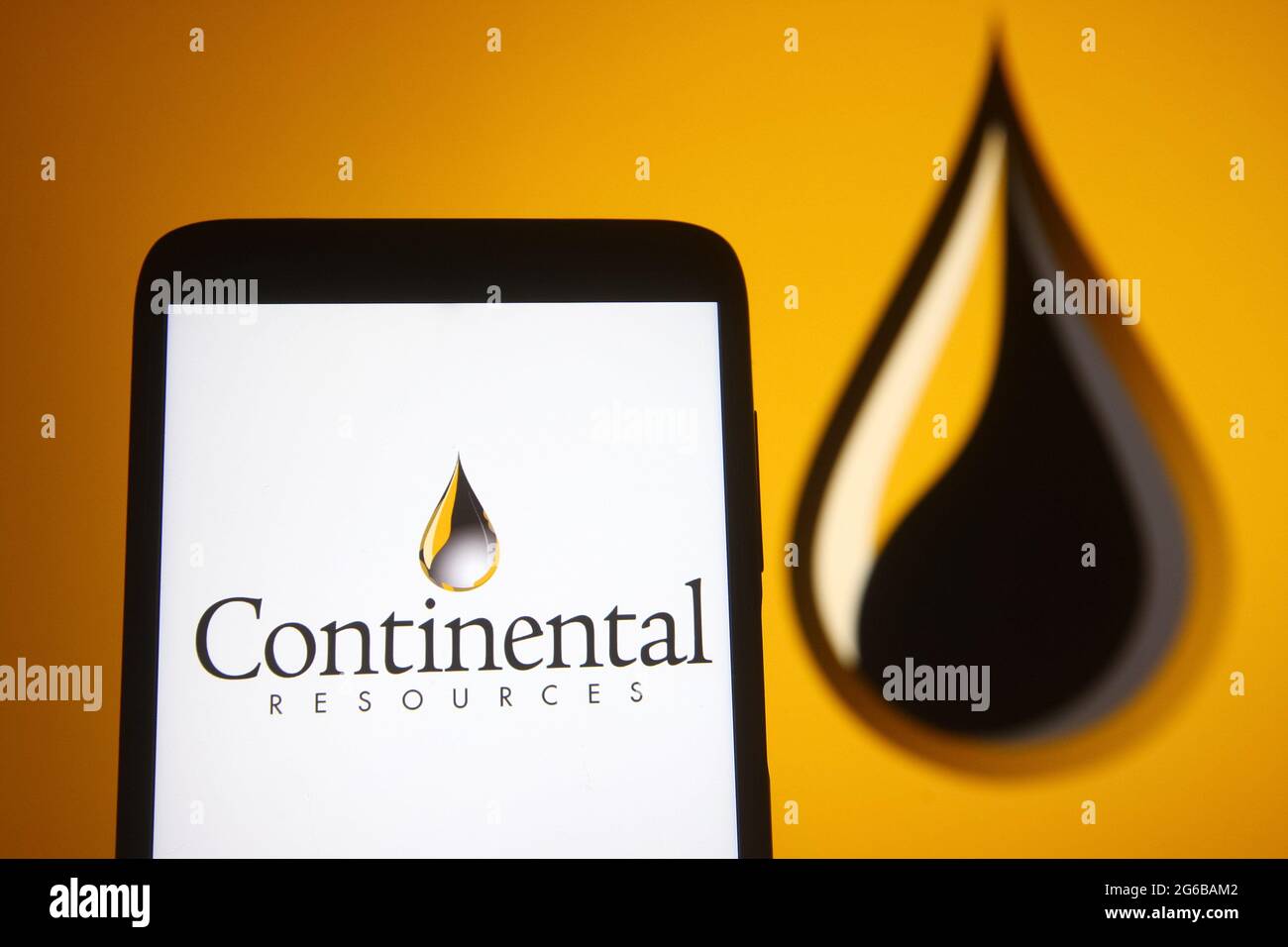 In this photo illustration a Continental Resources logo of a petroleum ...