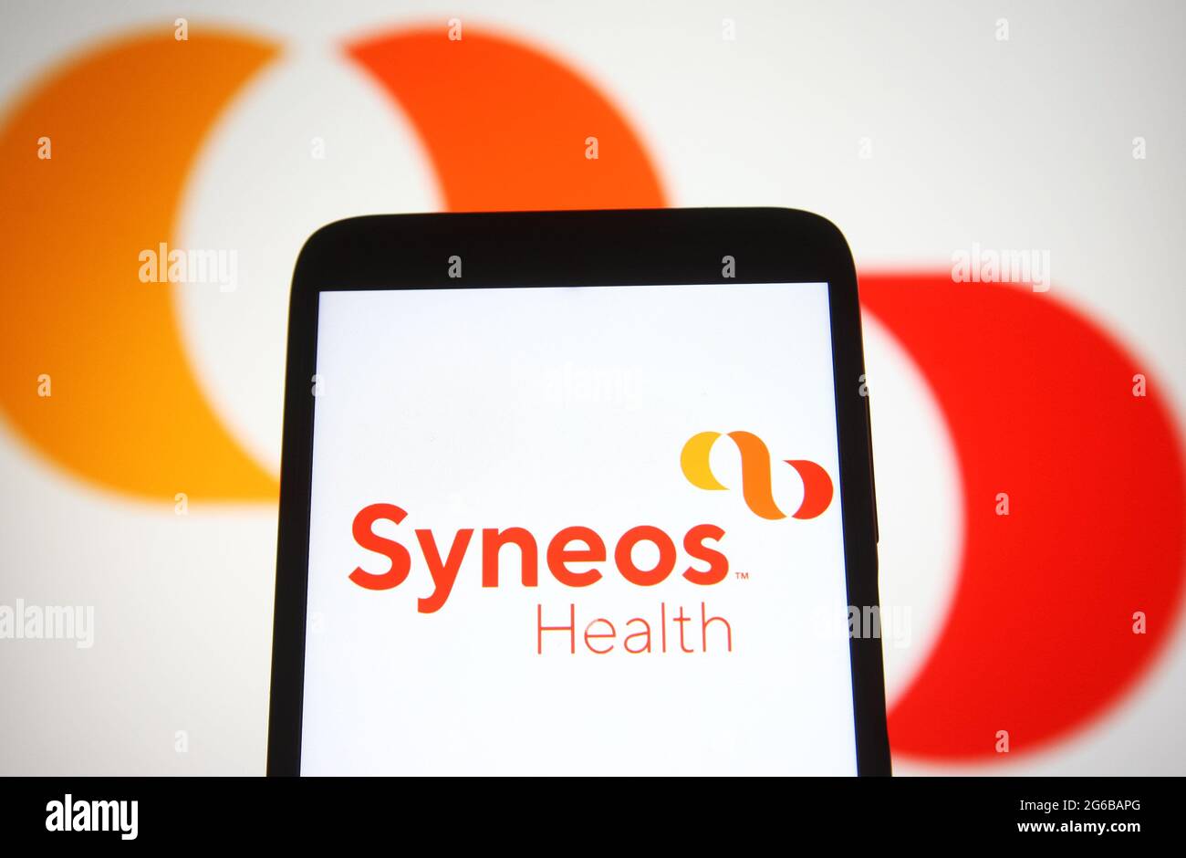 In this photo illustration a Syneos Health logo is seen on a smartphone ...