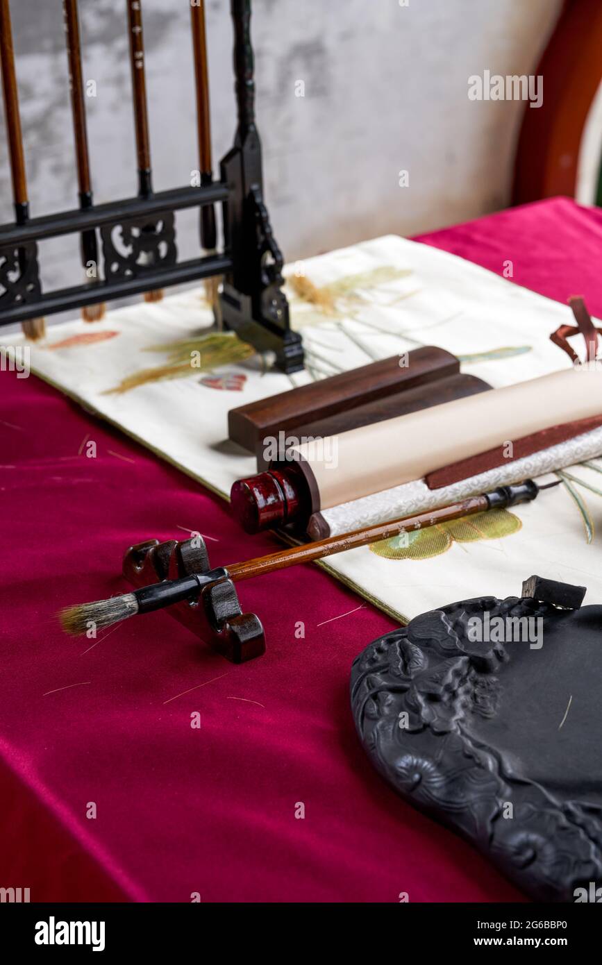 Pen, ink, paper, inkstone and writing desk of traditional Chinese ...
