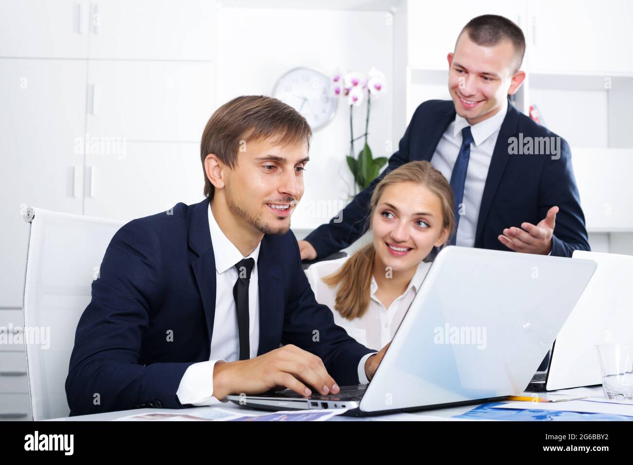 Positive satisfied business colleagues hi-res stock photography and ...