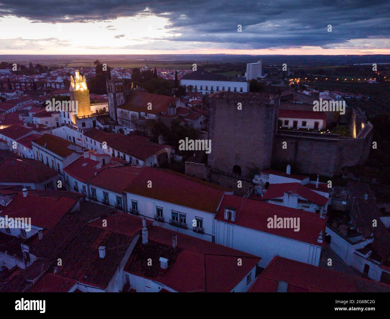 Night aerial view of Sepra with Castle and clock tower Stock Photo - Alamy