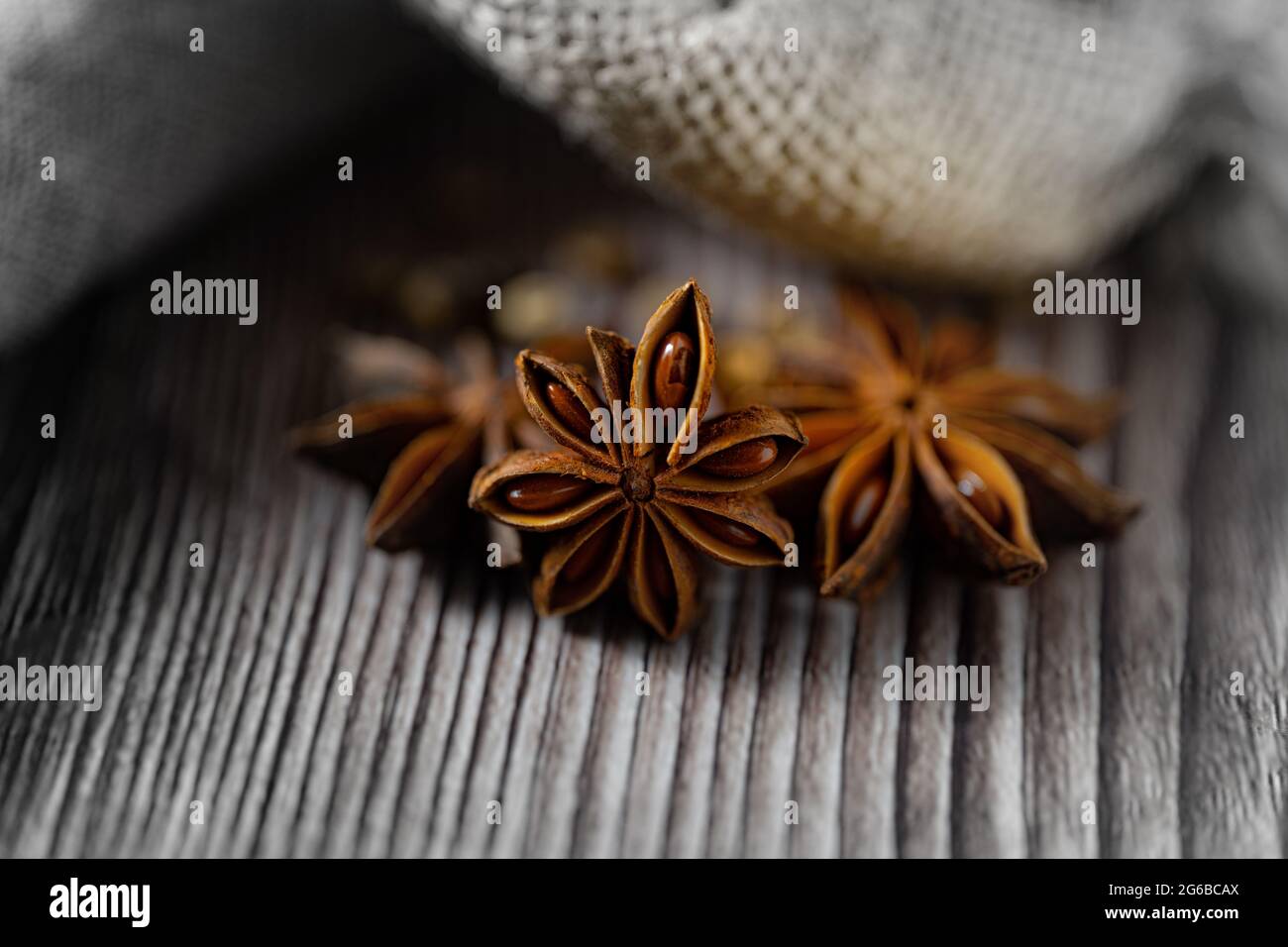 close up to star anise on wooden table, food concept Stock Photo - Alamy