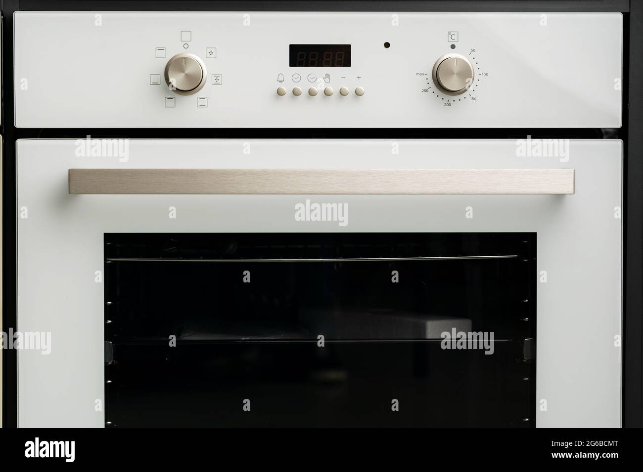 Modern oven mode control button close up Stock Photo - Alamy