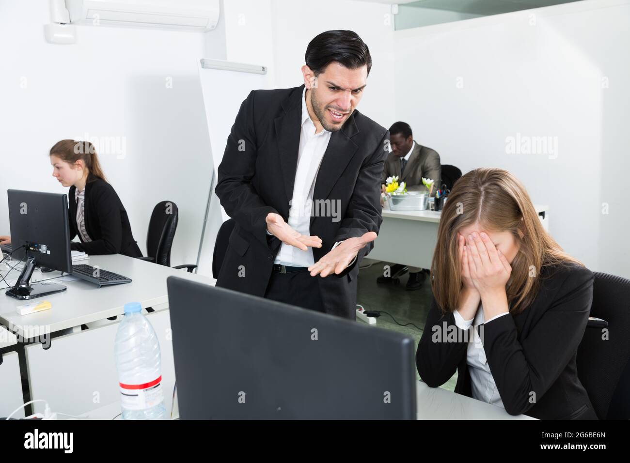 chief scolds the female manager Stock Photo - Alamy