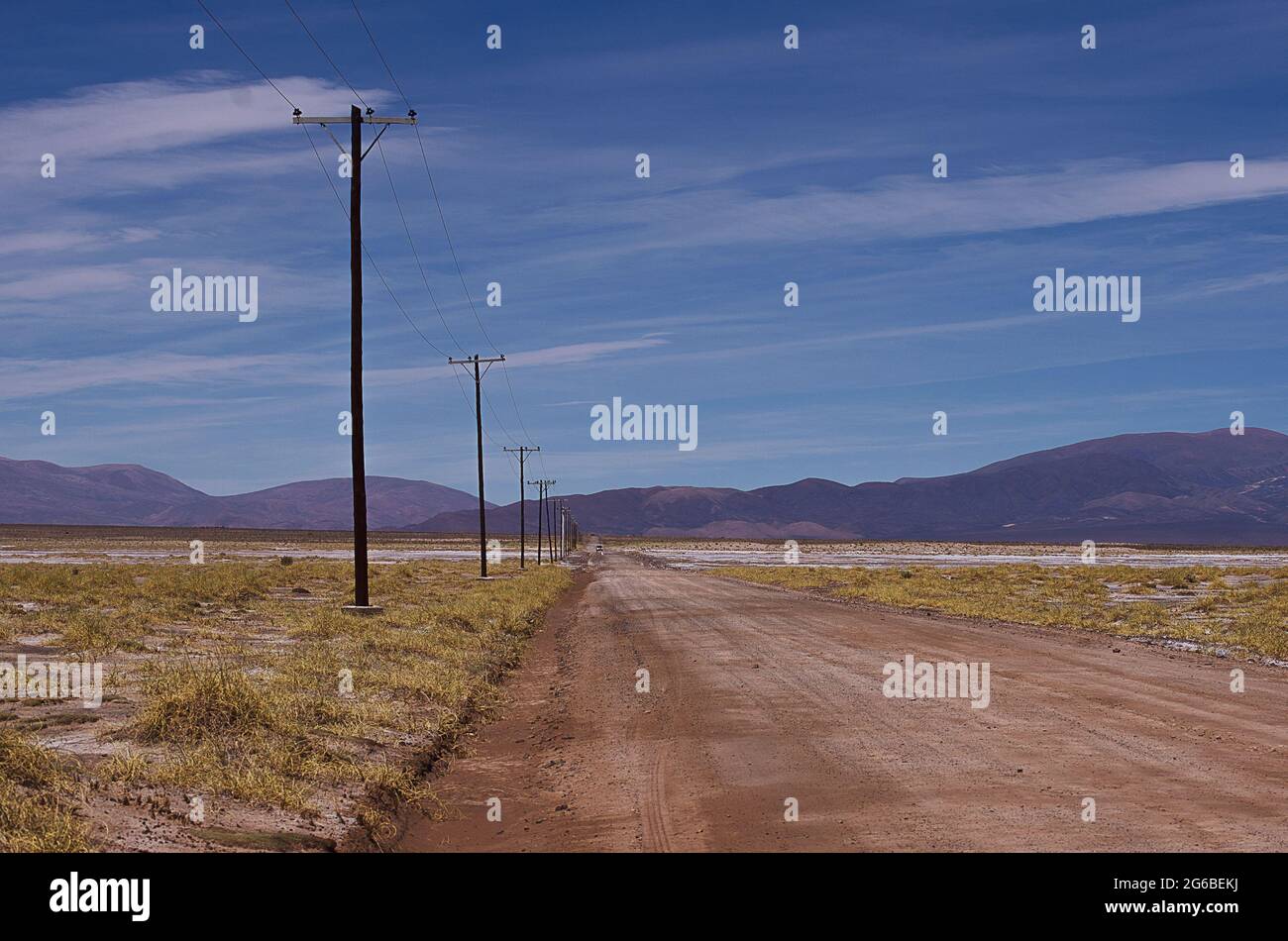 Electricity pylons along a road hi-res stock photography and images - Alamy