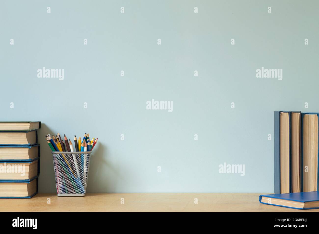 Home office desk table background. Empty wall with wooden table with ...