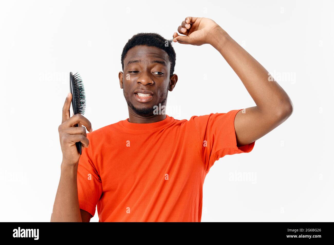 Man afro comb hi-res stock photography and images - Alamy