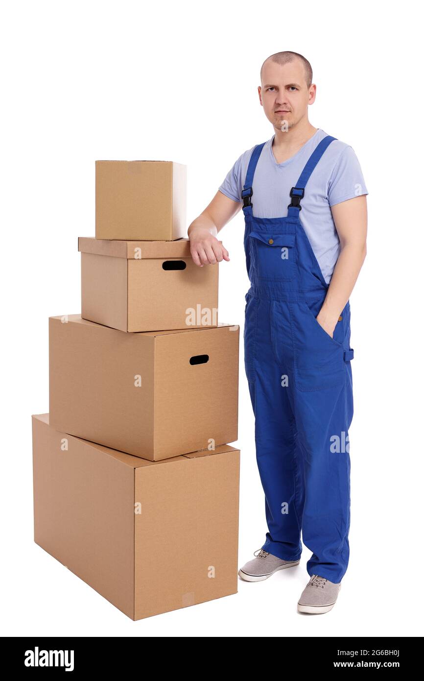 handsome loader man with heap of boxes isolated on white background ...