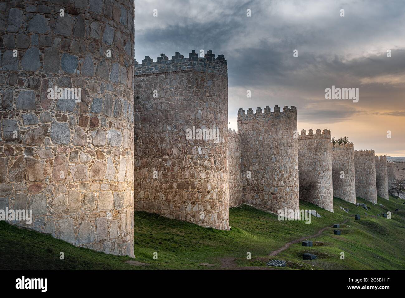 Medieval city wall built in the Romanesque style, Avila in Spain Stock ...
