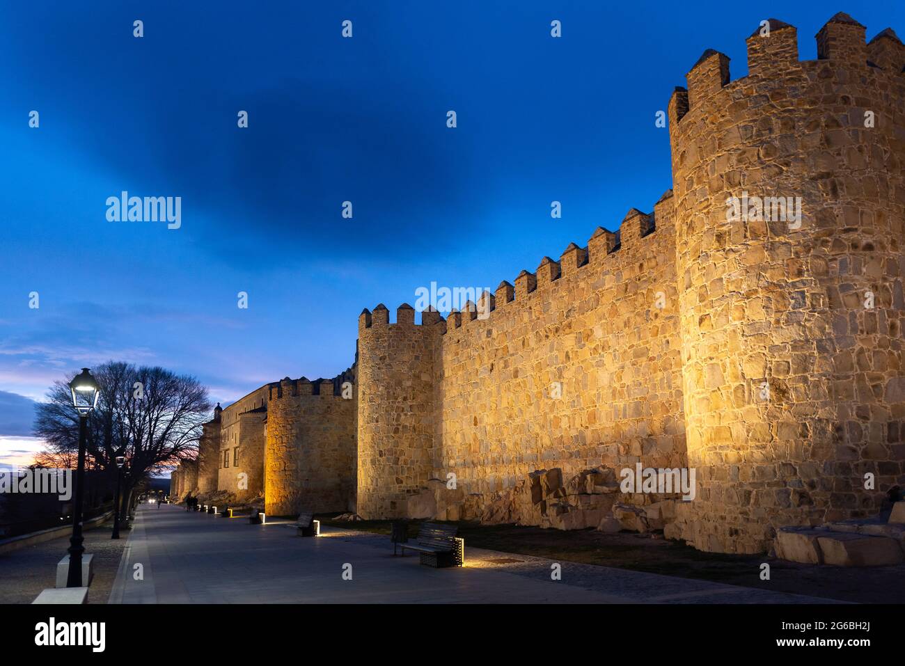 Medieval city wall of Avila at dusk, Spain Stock Photo - Alamy