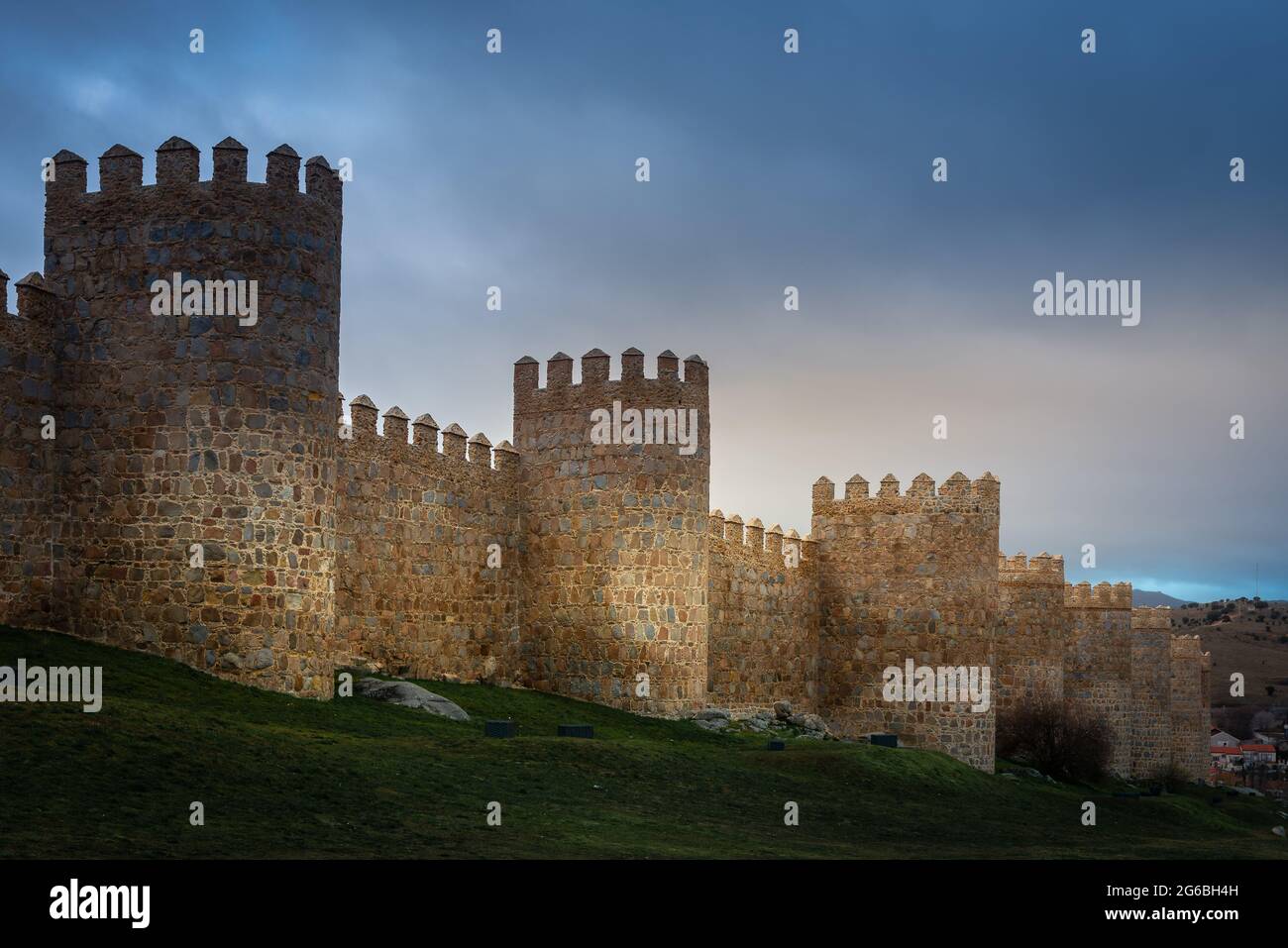 Medieval city wall built in the Romanesque style, Avila in Spain Stock ...