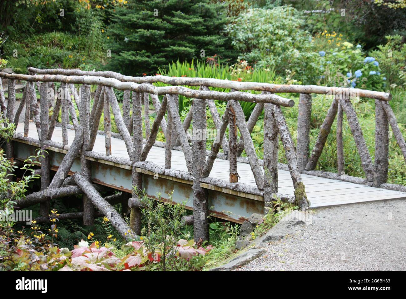 Rustic wooden pedestrian bridge hi-res stock photography and images - Alamy