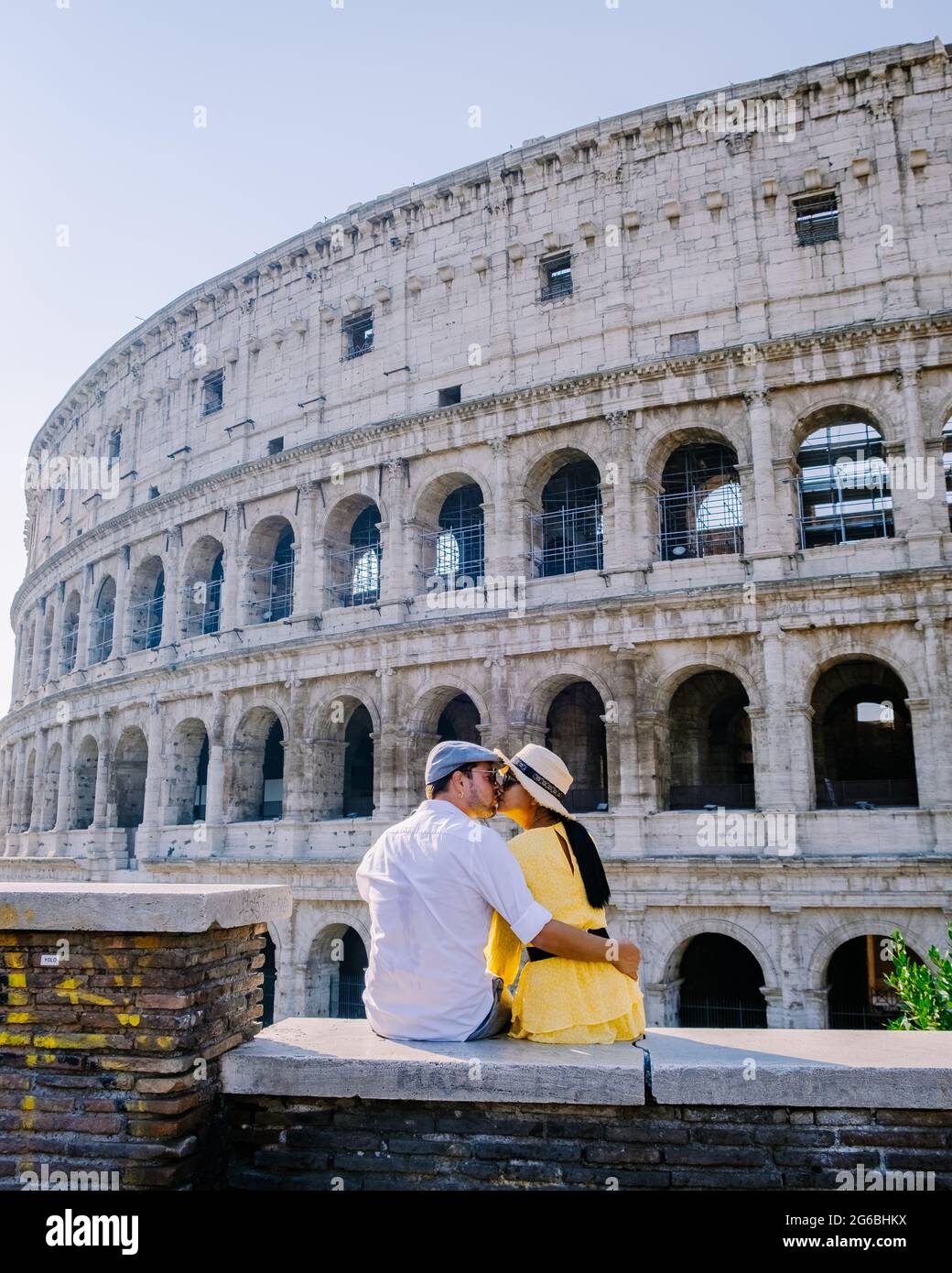 young couple mid age Asian woman and European man on a city trip in ...
