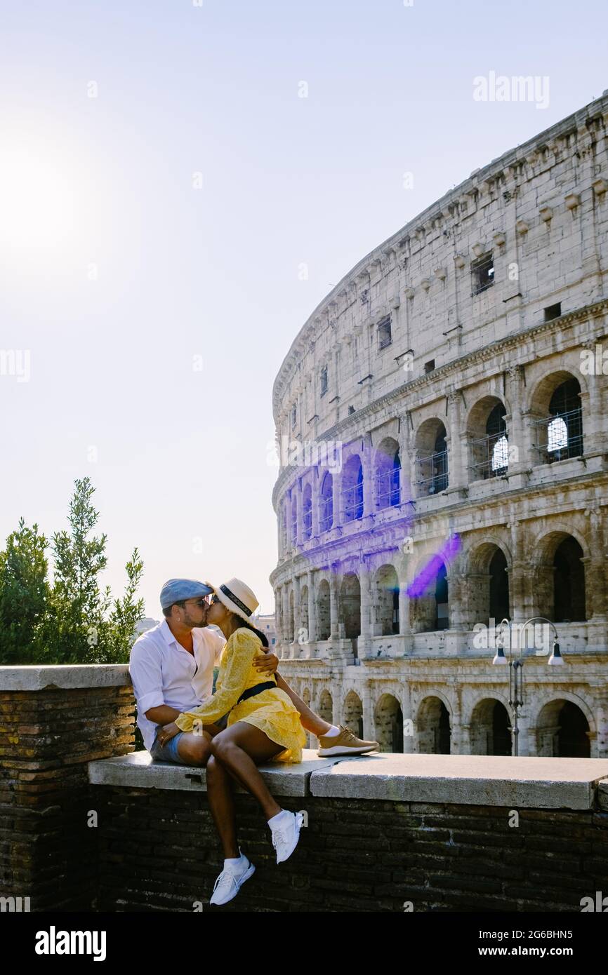young couple mid age Asian woman and European man on a city trip in ...