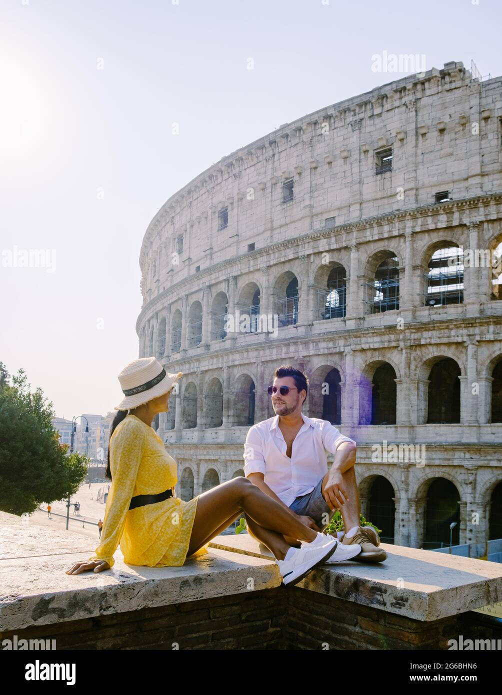 young couple mid age Asian woman and European man on a city trip in ...