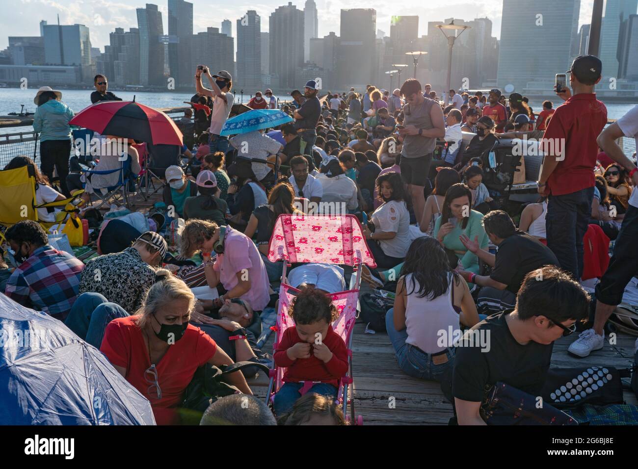 NEW YORK, NY - JULY 04: Spectators wait for the 45th annual Macy's 4th ...